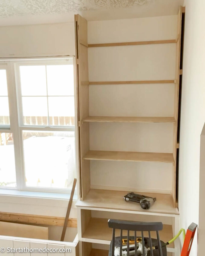 How to Build a DIY Custom Built-in Around Window - Brooke Nicole Larsen