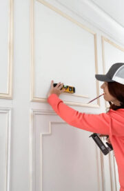 7 Steps to Create a DIY Picture Frame Molding Accent Wall - Brooke ...
